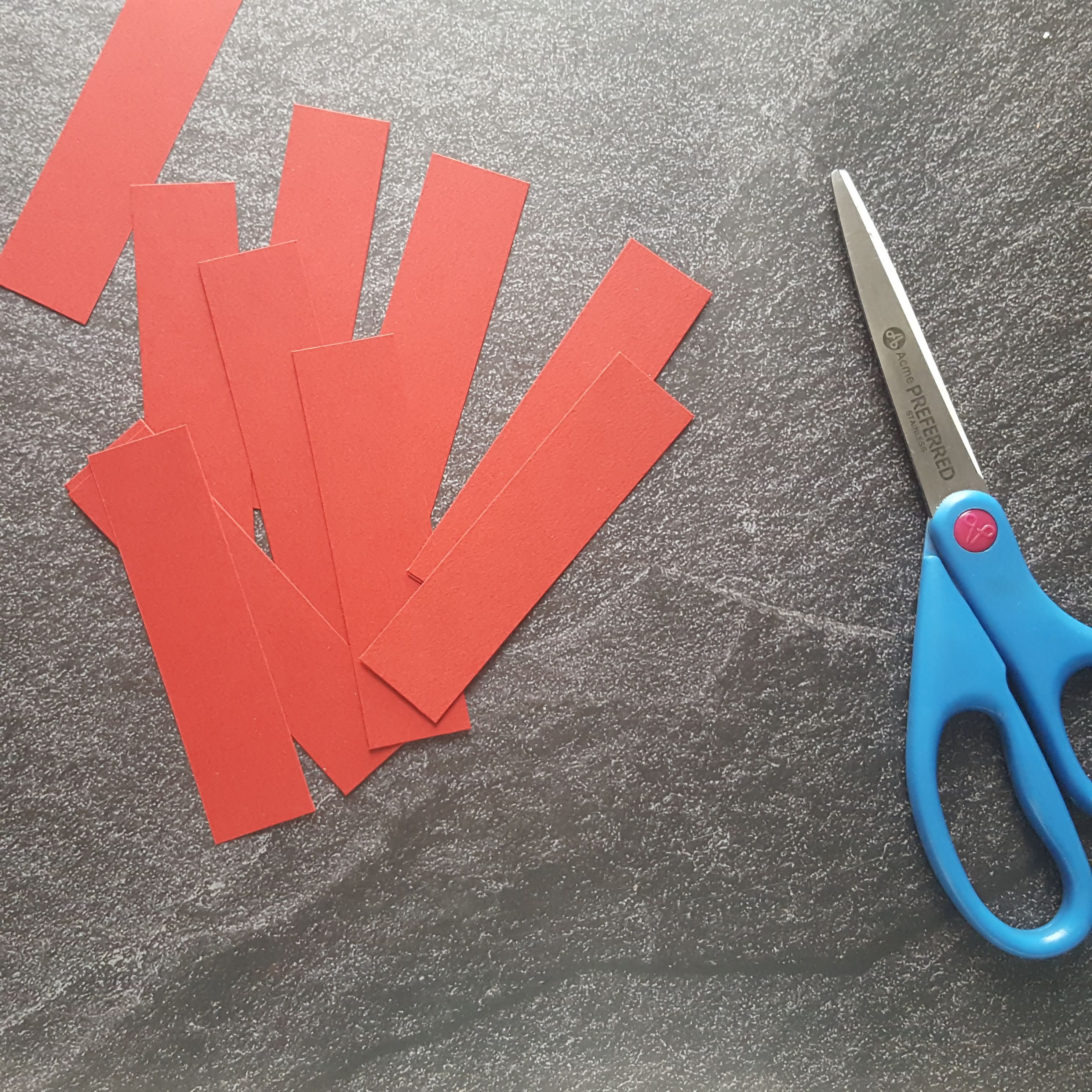 How To Make A Quick And Easy Paper Strip Party Garland – Team Colors By ...